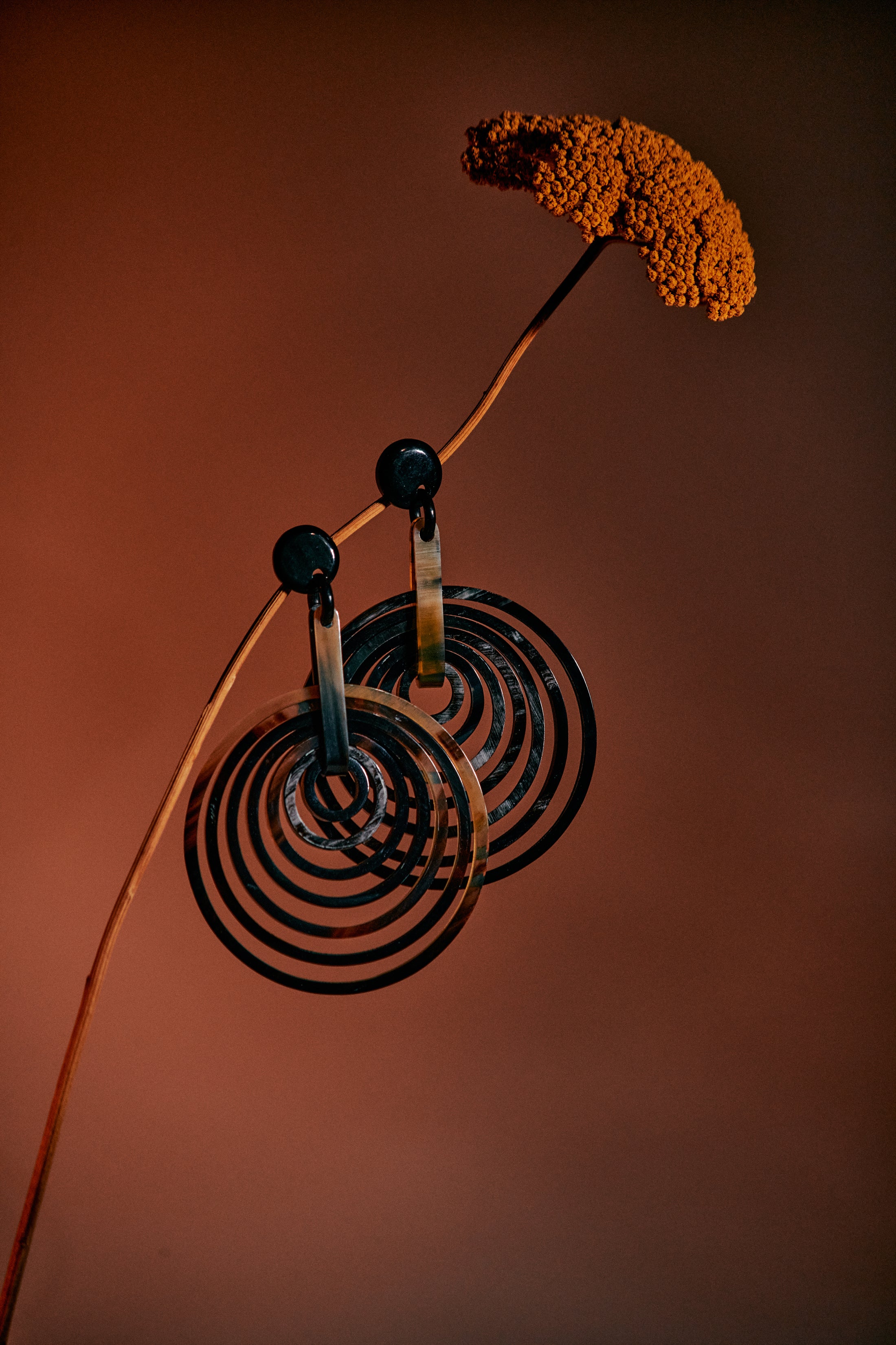 Iman earrings chocolate – Cuckoo B